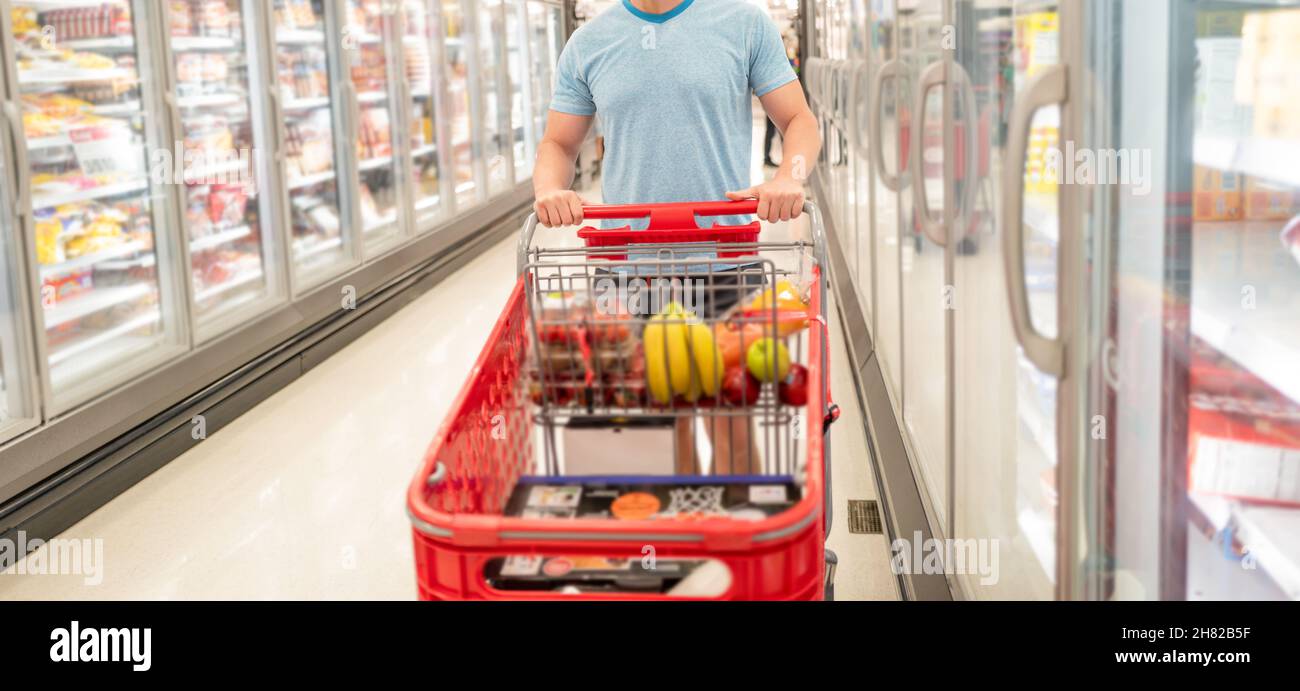 Man shopping cart trolley hi-res stock photography and images - Alamy