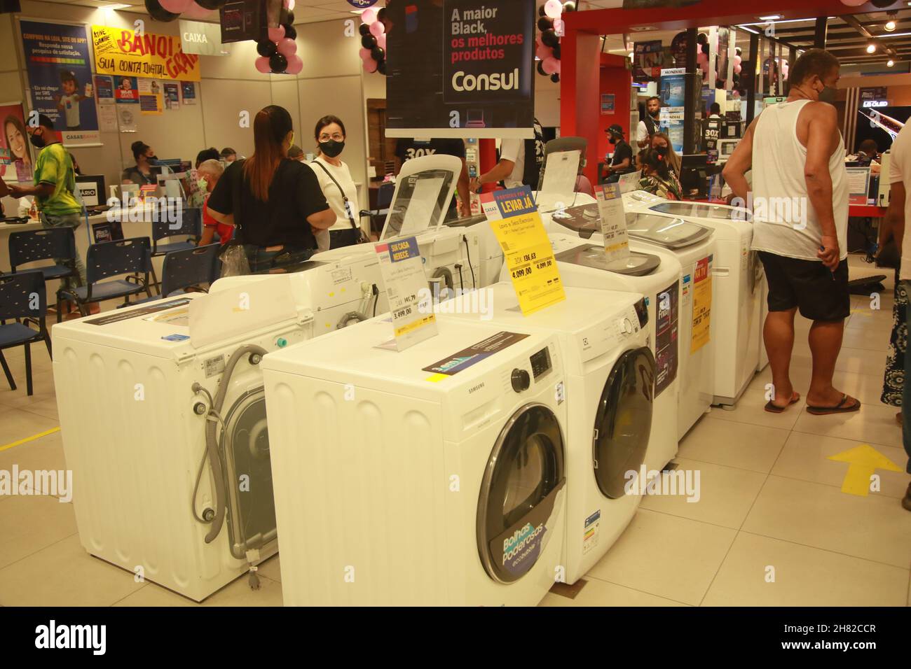 salvador, bahia, brazil - november 26, 2021: customers next to a ...