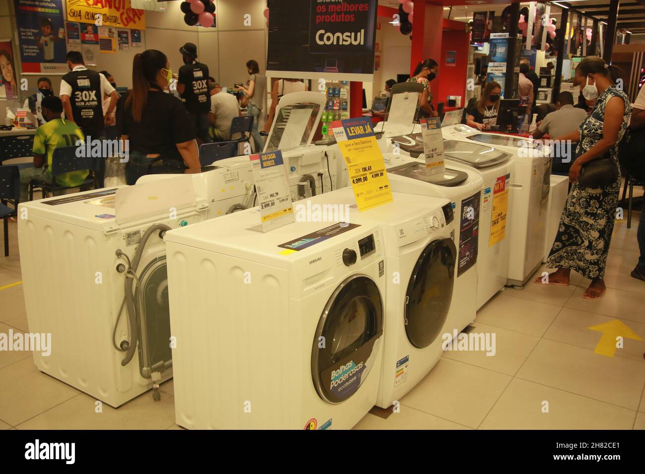 salvador, bahia, brazil - november 26, 2021: customers next to a ...