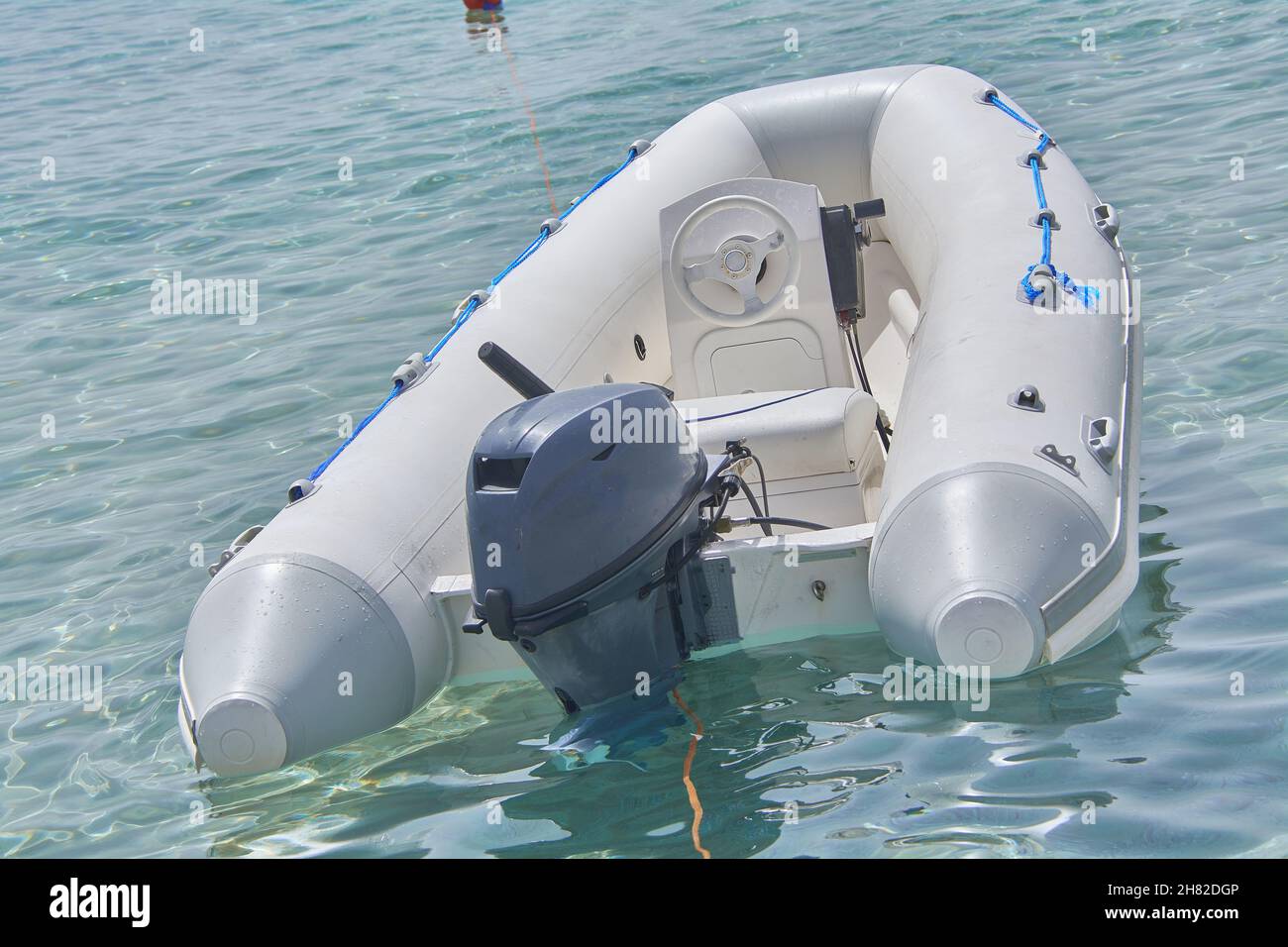 The raft on the crystal clear water of the sea Stock Photo - Alamy