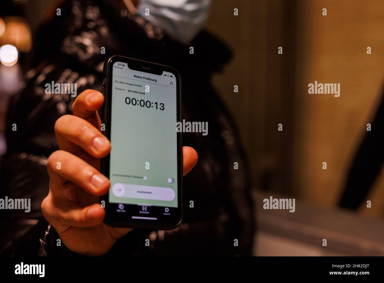 Freiburg Im Breisgau, Germany. 26th Nov, 2021. A visitor to a club ...