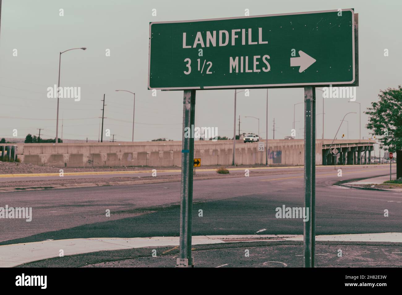 Sign for a landfill trash garbage dump, 3 miles Stock Photo - Alamy