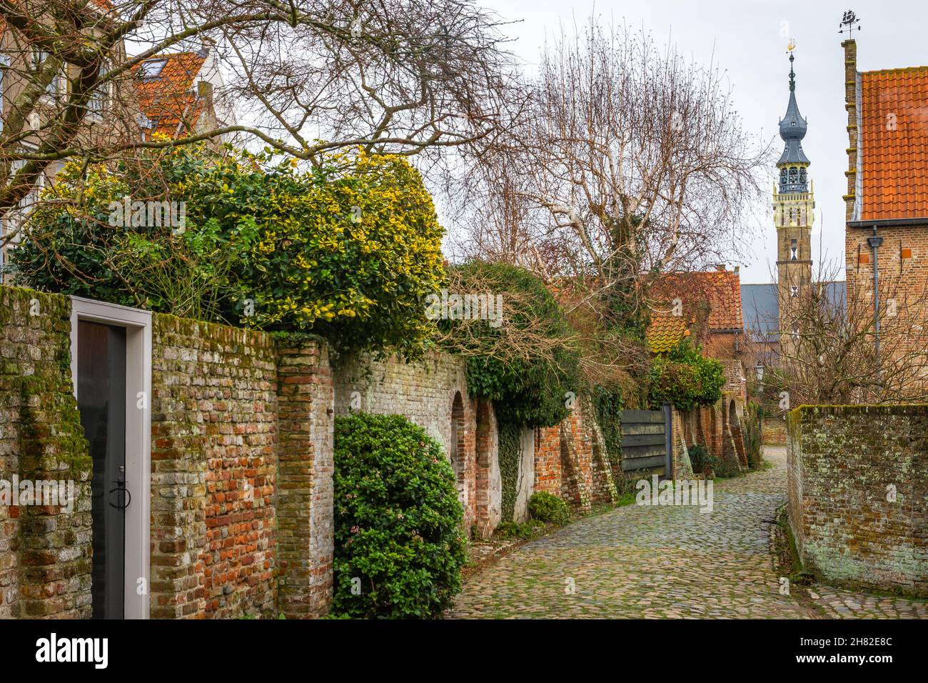 Old street in the town of Veere, Province Zeeland, with the view of ...