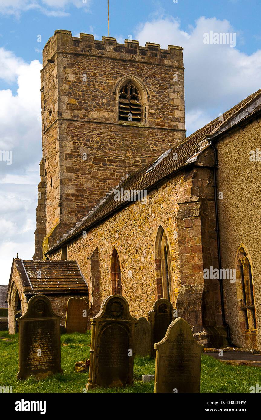 All Hallows Church and churchyard in the village of Great Mitton ...