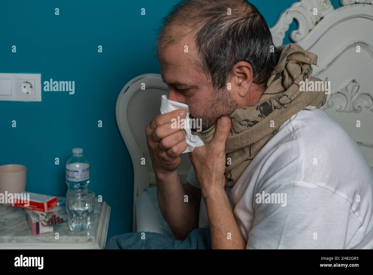 sick man in bed with fever Stock Photo - Alamy