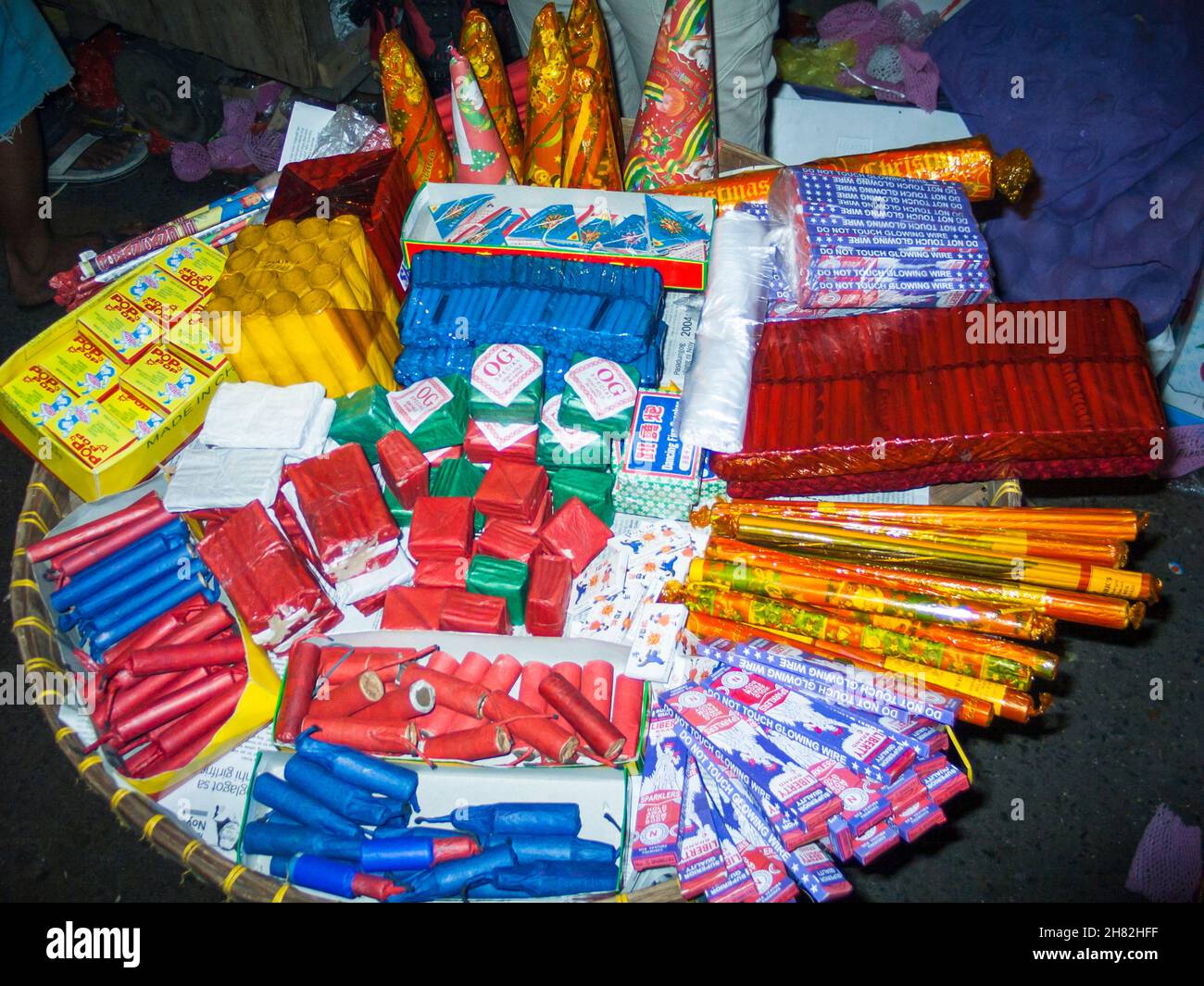 Firecrackers sold at the sidewalk in Cebu City, Philippines as part of ...