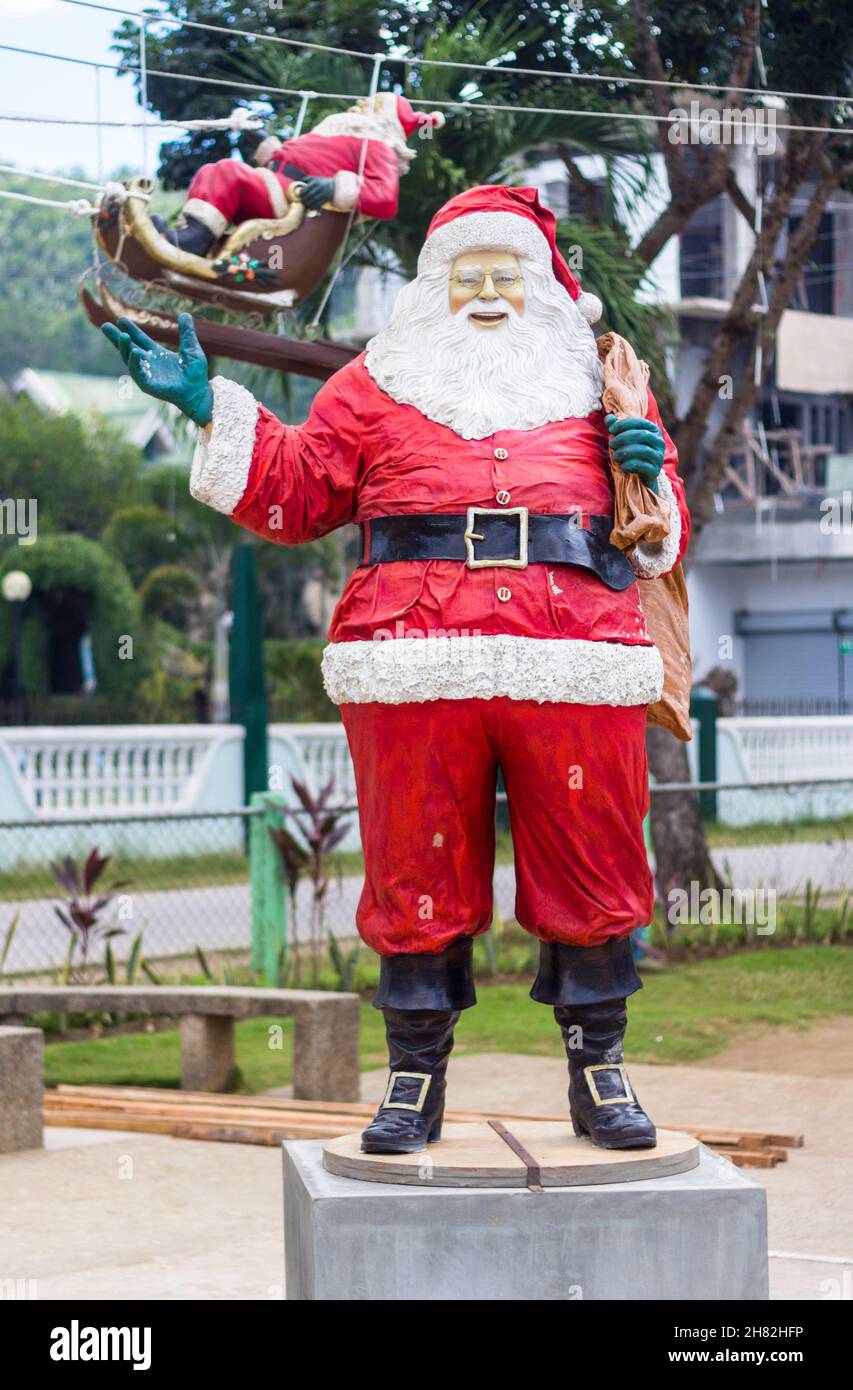 Santa Claus statue during Christmas in Quezon, Philippines Stock Photo ...