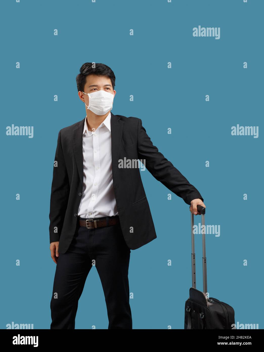 New normal lifestyle ,Business man travelling and wearing face mask ...