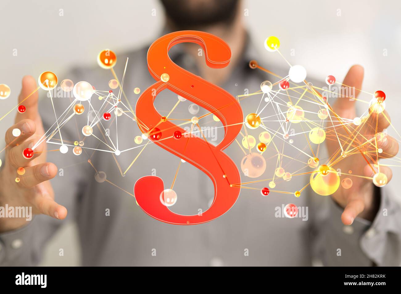 Hologram of a section sign symbol between a lawyer's palm; legal code ...