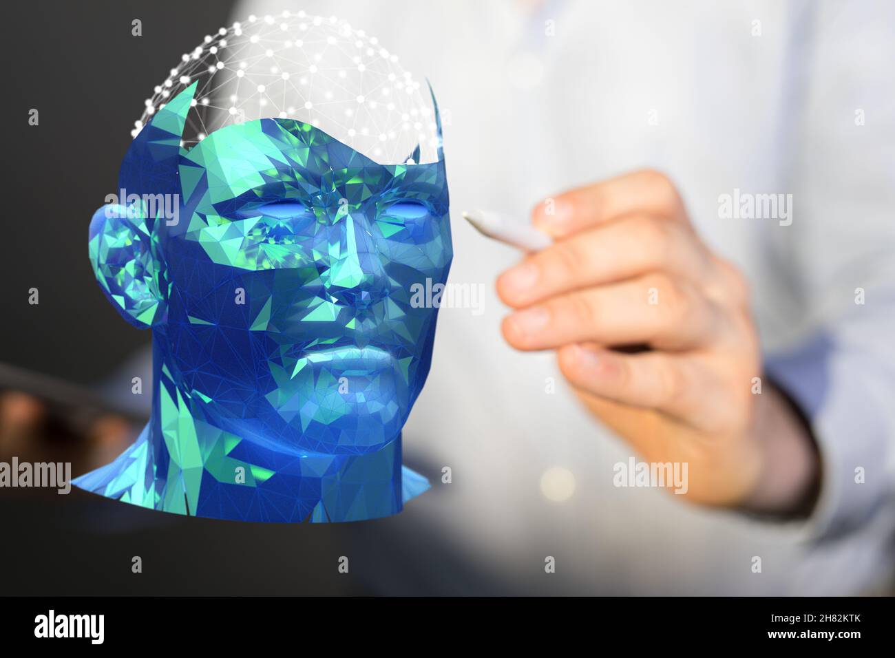 Computer scientist creating a 3D rendering of a cyborg head hologram ...