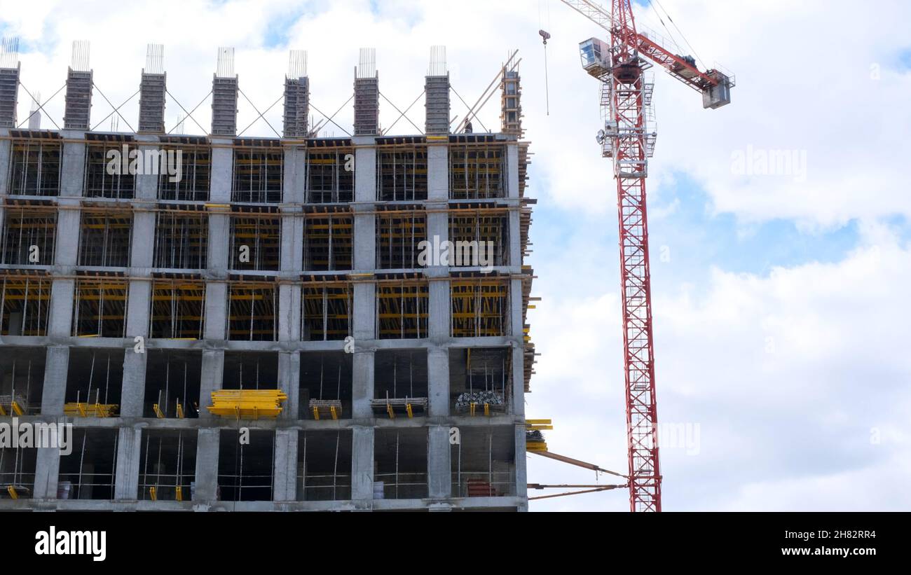 Construction site with scaffolding, a residential building under ...