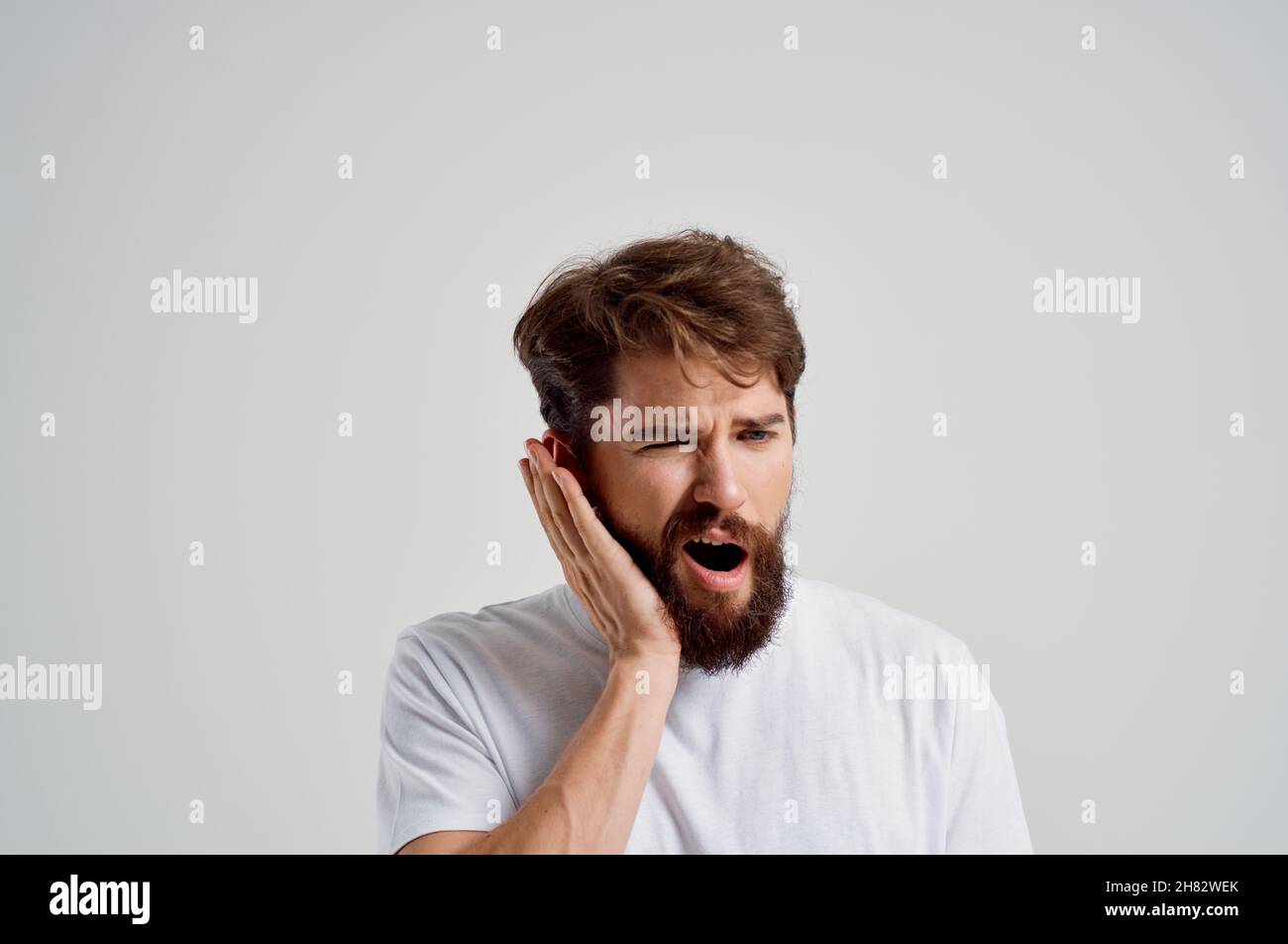 emotional man dental problem dentistry treatment light background Stock ...