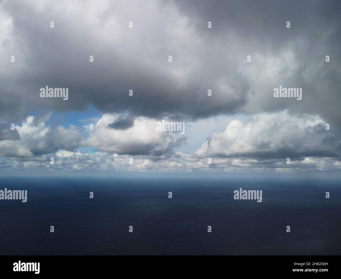 Video fluffy clouds on blue hi-res stock photography and images - Alamy
