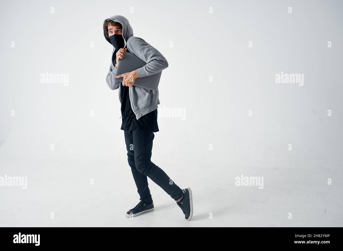 hacker hooded head hacking technology security light background Stock ...