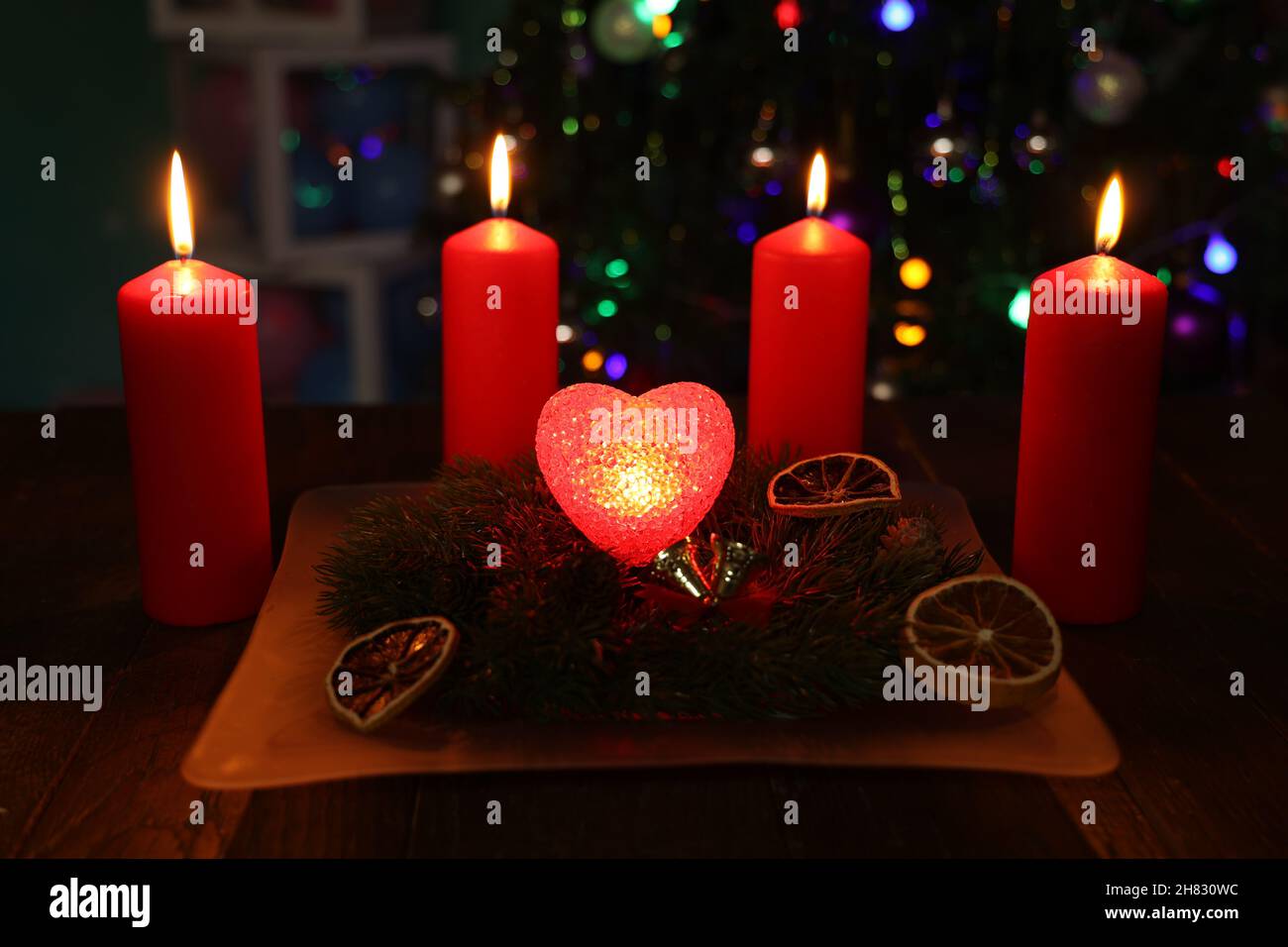 Fourth advent, four candles burning. Advent background Stock Photo - Alamy