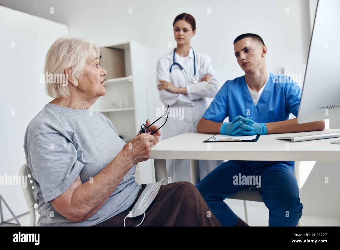 patient at the doctor's and nurse's appointments in the medical office ...