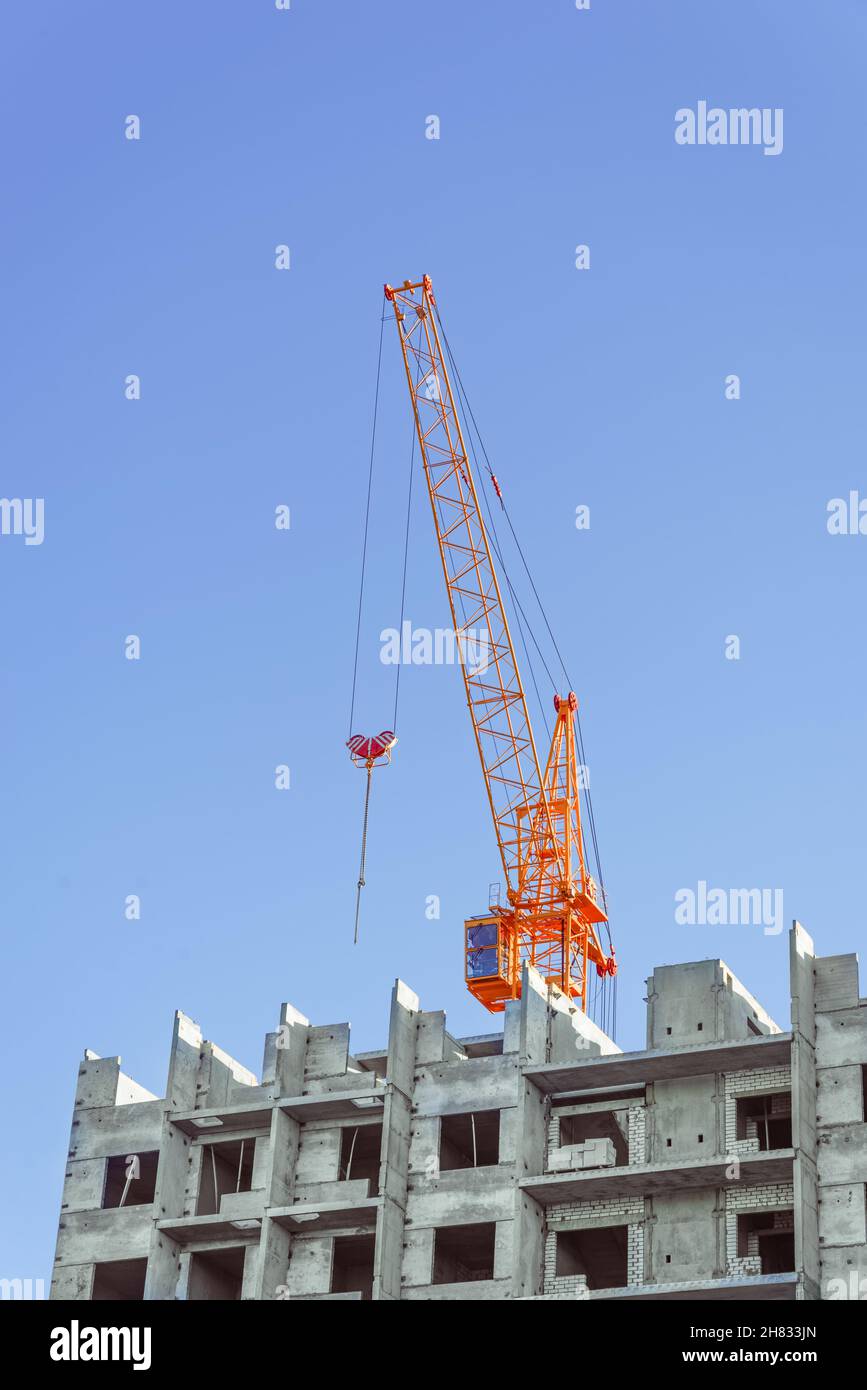 Hoisting tower cranes and construction of high-rise building Stock ...