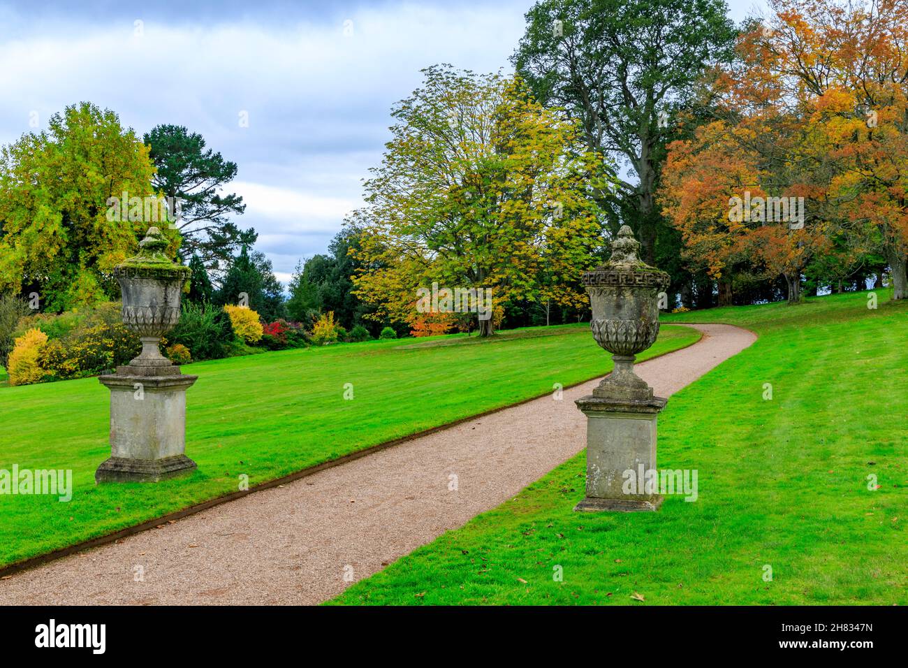 Vibrant autumn colour of trees and shrubs in the grounds of the ...