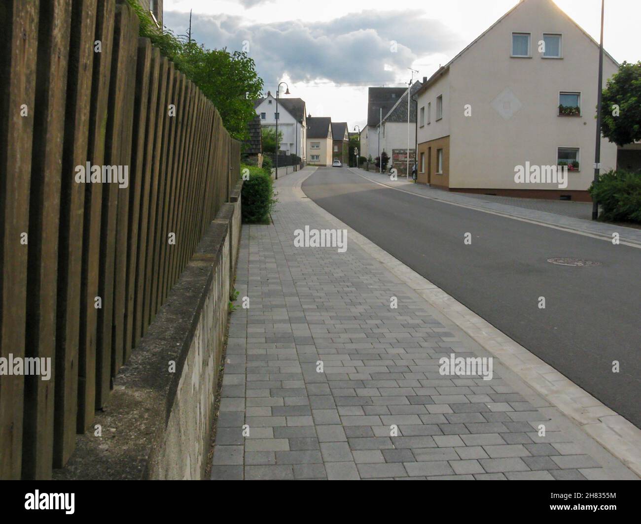 Empty street in the quiet town of Lautzenhausen, Hunsrück, Germany ...