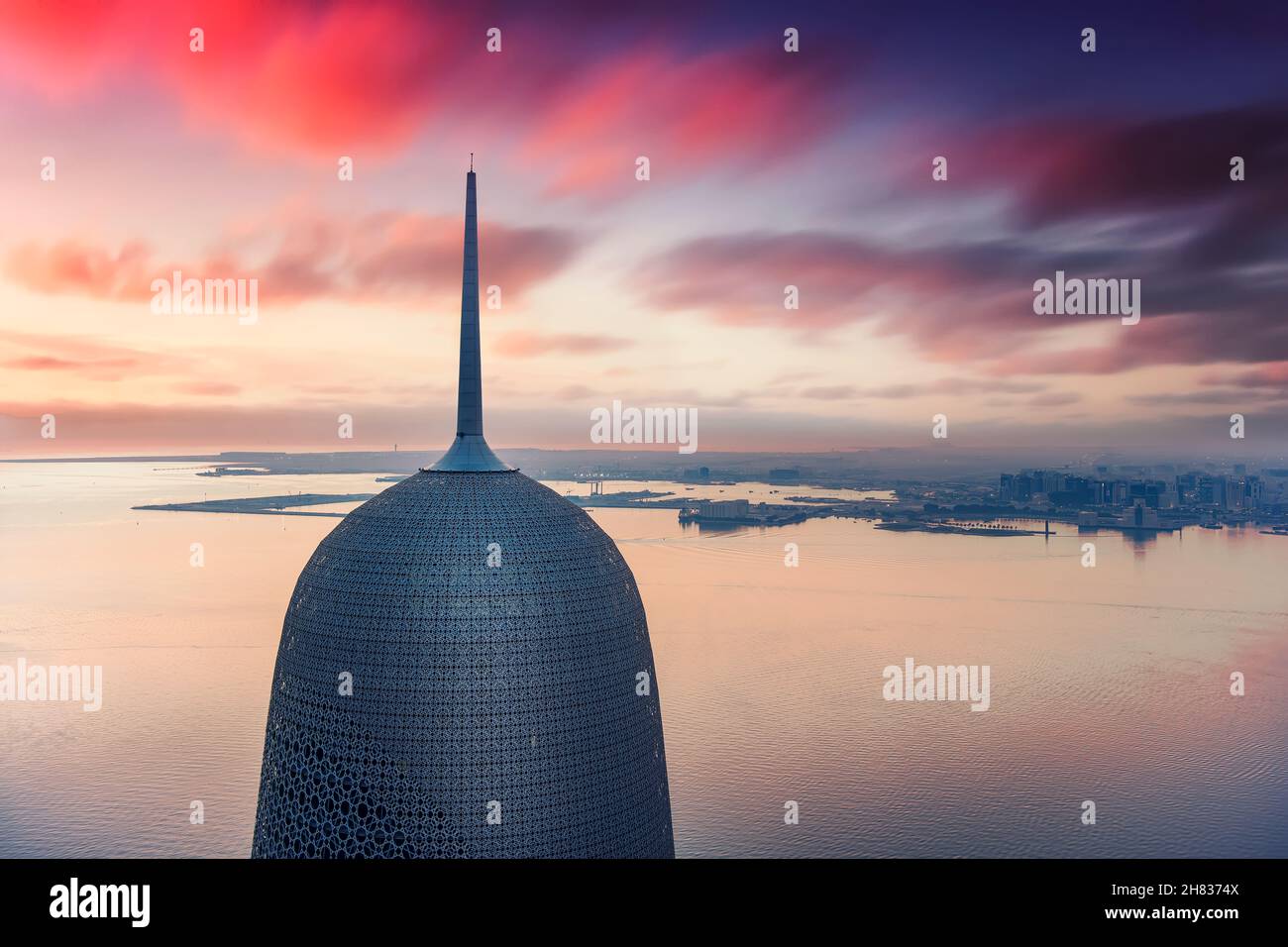 Sunrise view of Burj Doha. Iconic Doha Tower Stock Photo - Alamy