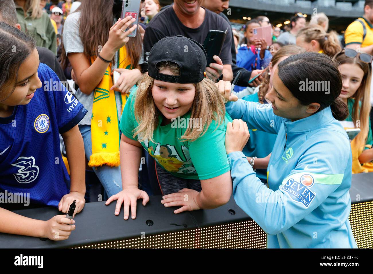 Sydney, Australia. 27th Nov, 2021. Sam Kerr of Australia signs a fans ...