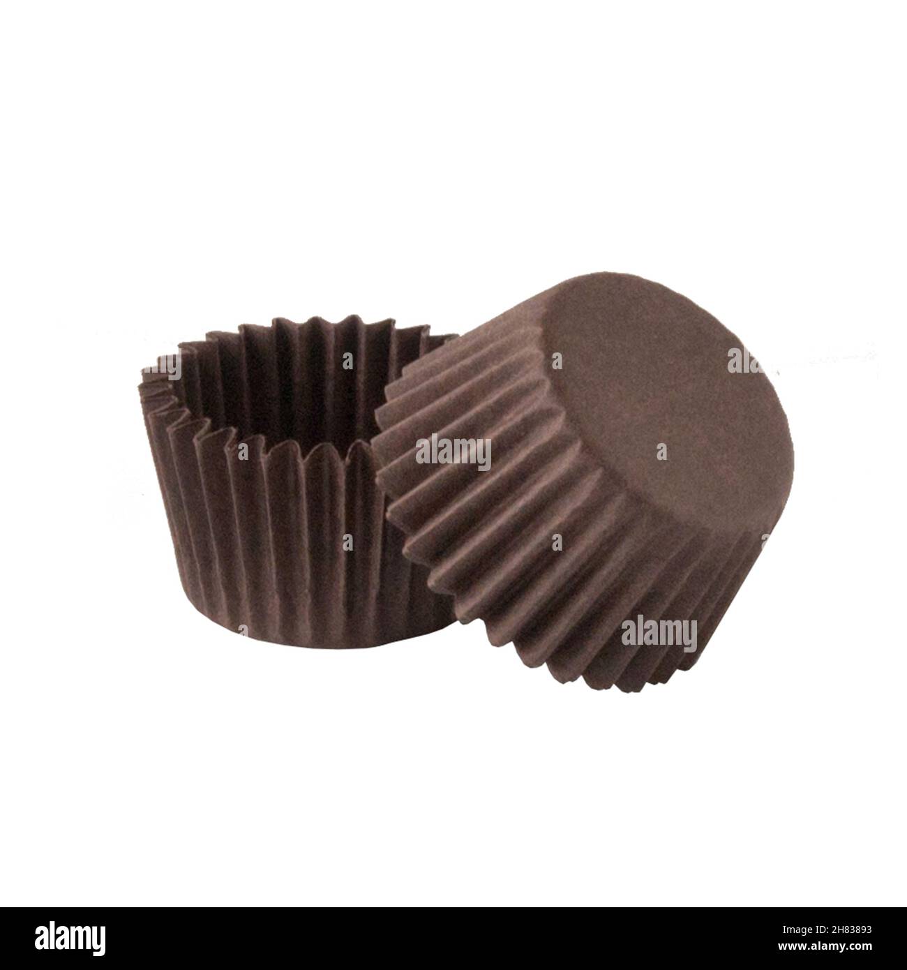 Brown paper baking forms for muffins isolated over white background ...