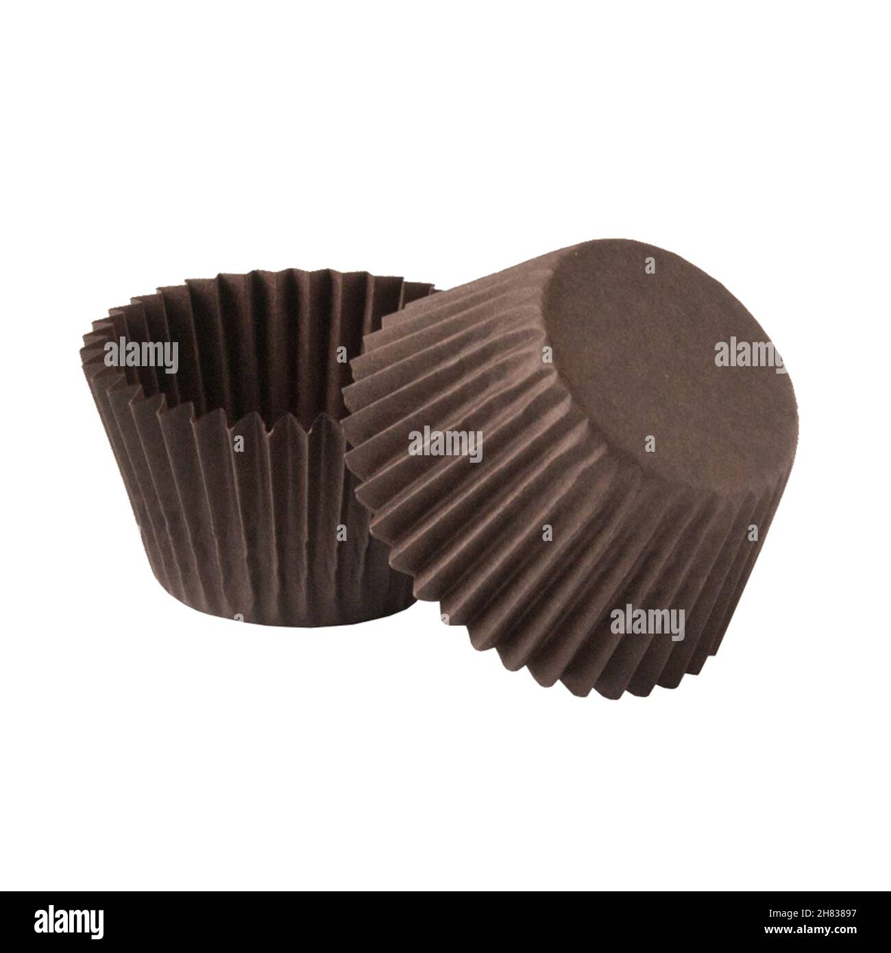 Brown paper baking forms for cakes isolated over white background ...