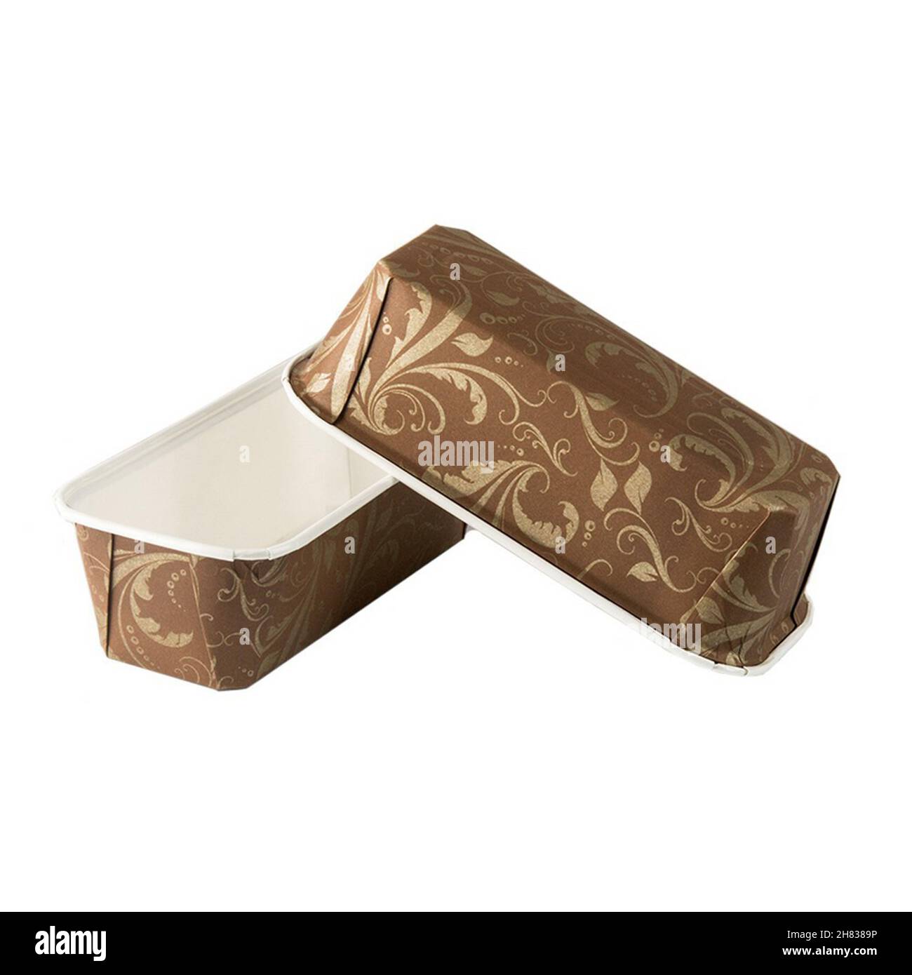 Paper baking form for cakes and bread isolated over white background ...