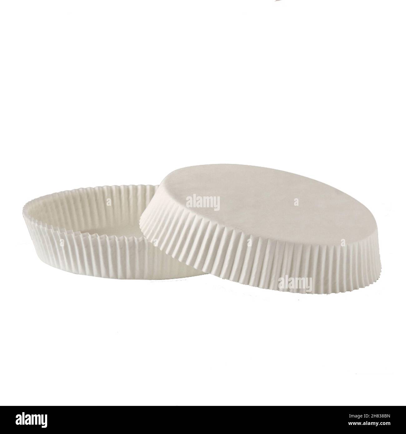 Flat paper baking form for cakes and bread isolated over white ...