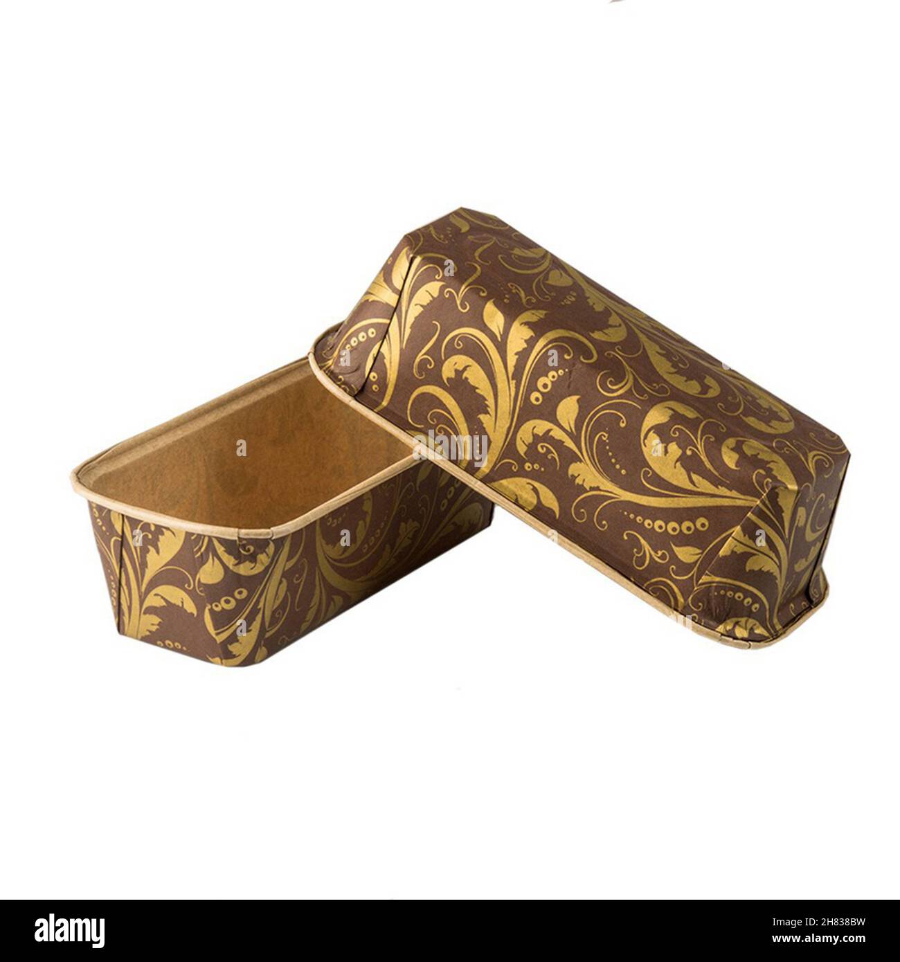 Paper baking form for cakes and bread isolated over white background ...