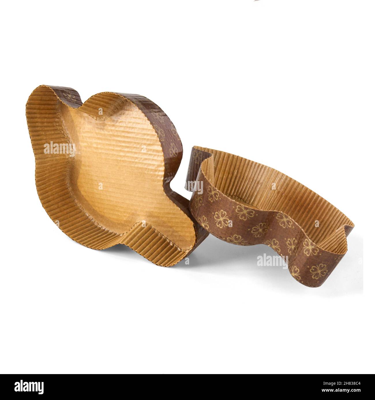 Paper baking form for cakes and bread isolated over white background ...