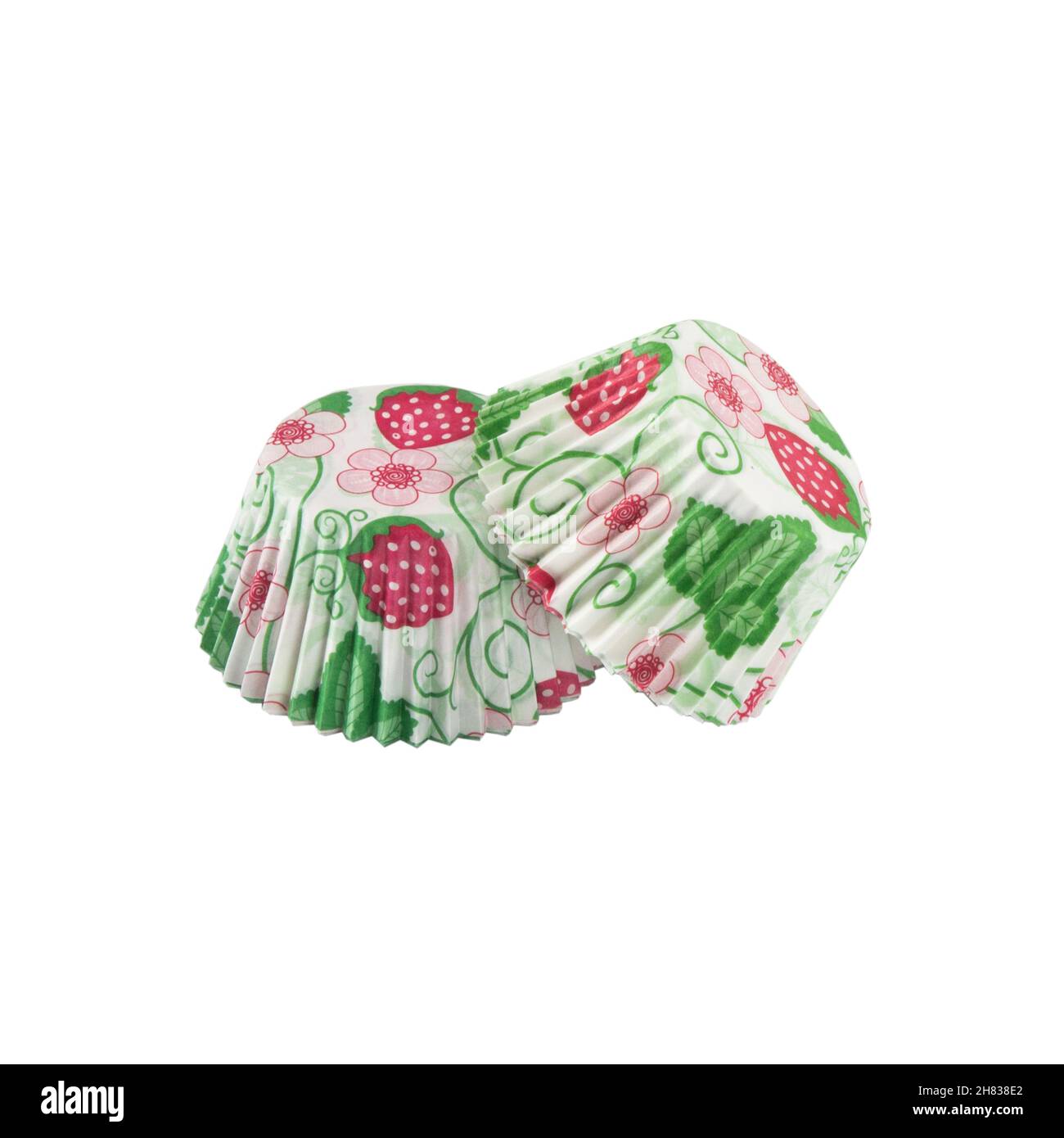 White paper baking forms for muffins and cupcakes with flowers and ...