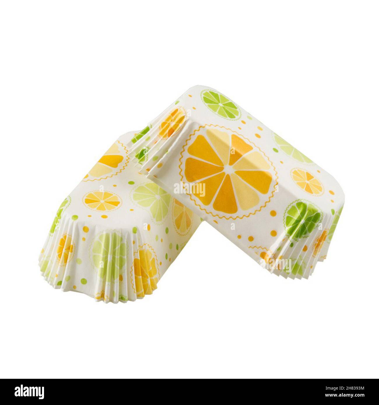 White paper baking forms for cakes with citrus pattern isolated over ...