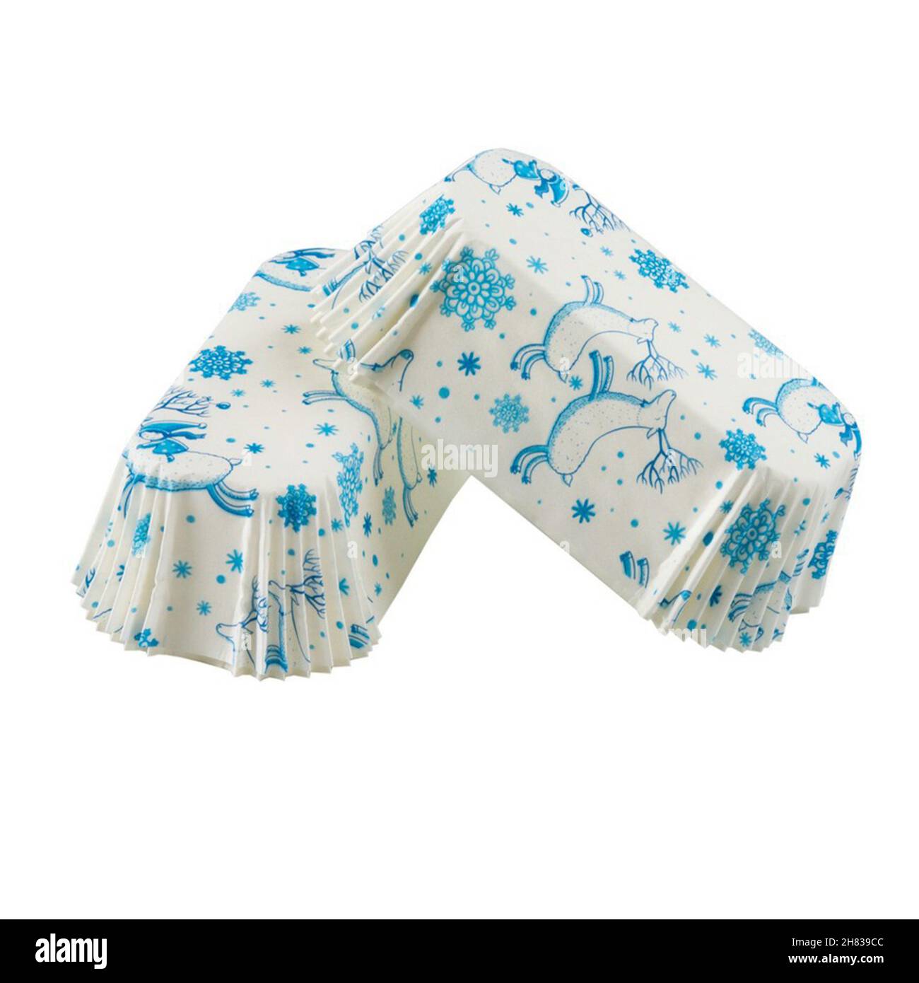 White paper baking forms for cakes with winter deer pattern isolated ...
