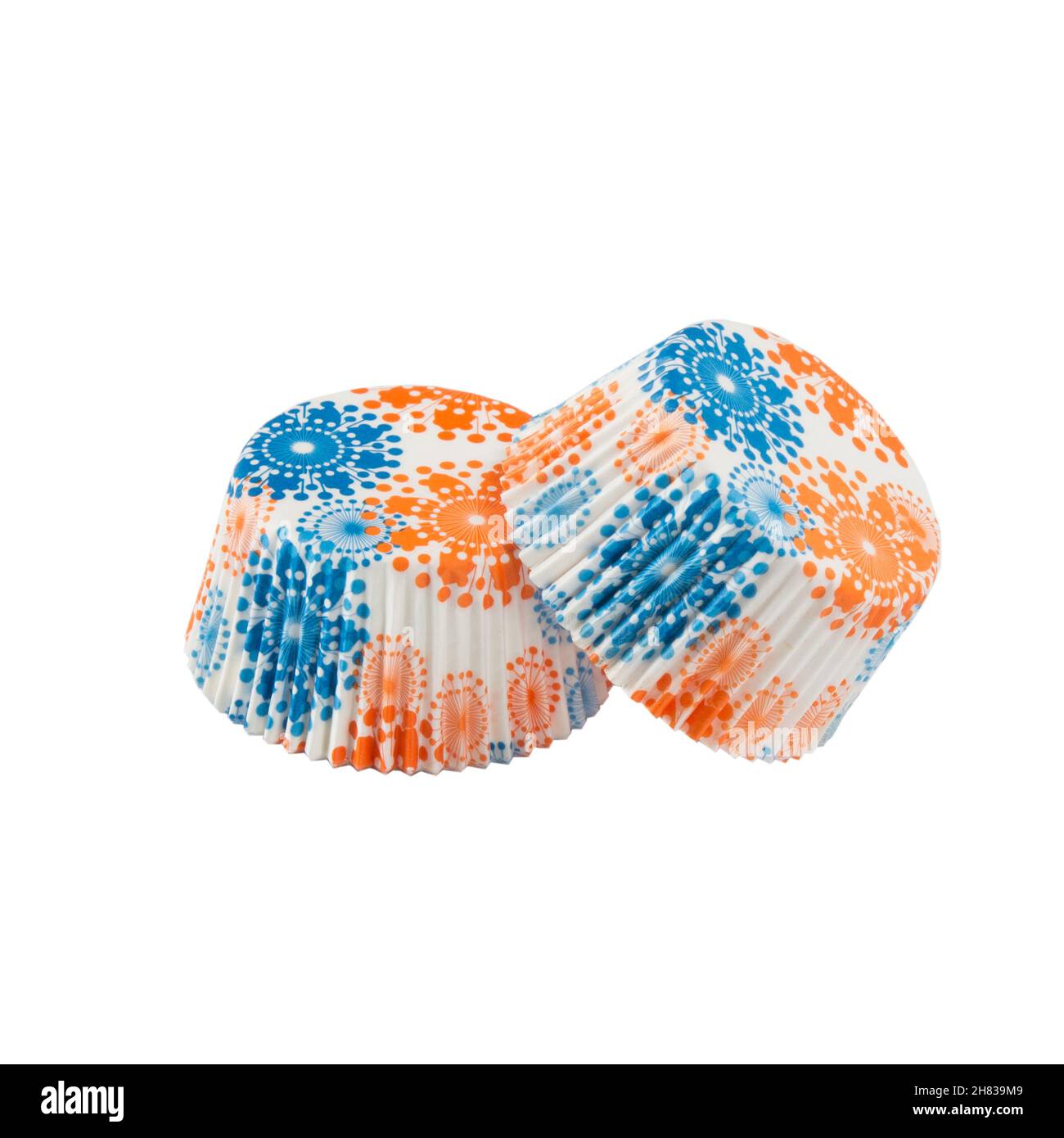 White paper baking forms for muffins and cupcakes with fireworks ...