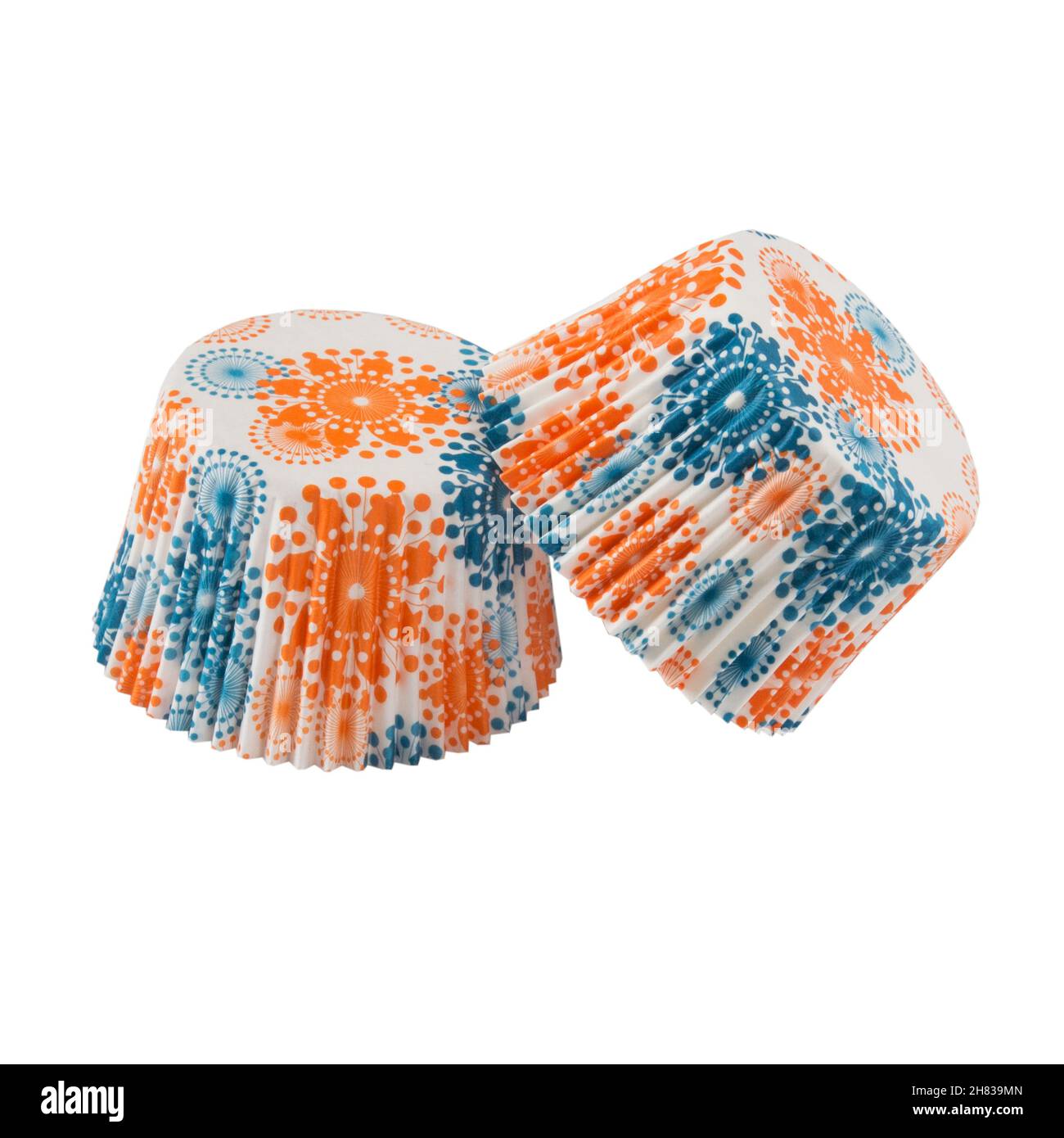 White paper baking forms for muffins and cupcakes with fireworks ...