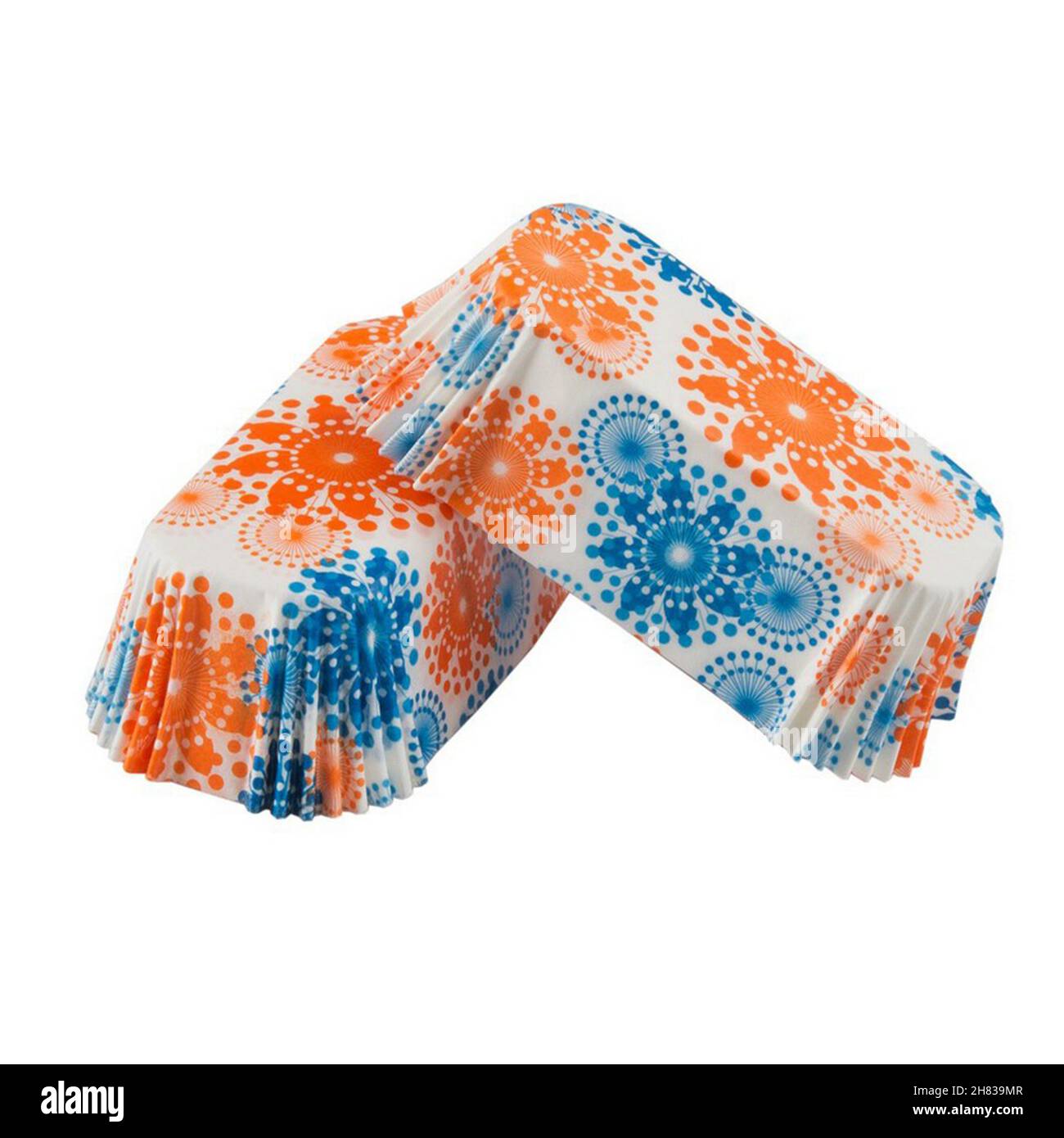 White paper baking forms for cakes with fireworks pattern isolated over ...