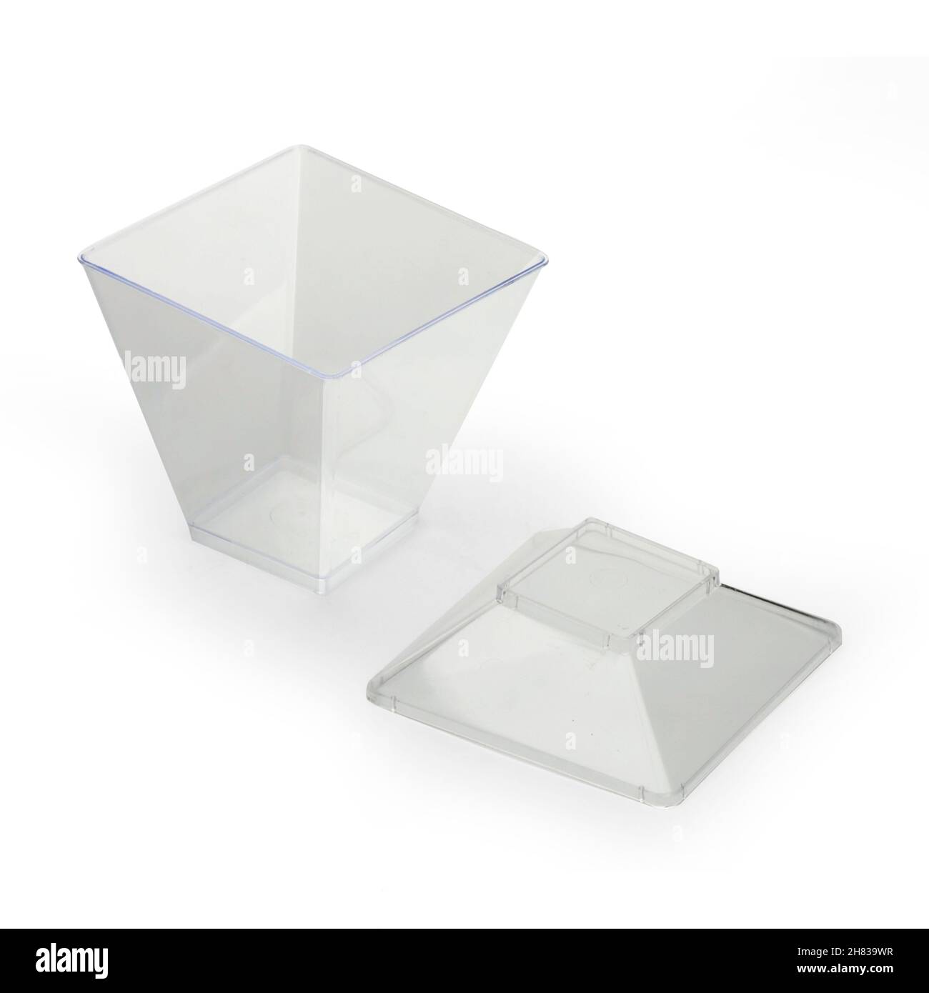 Plastic square cup or glass isolated over white background, a glass for ...
