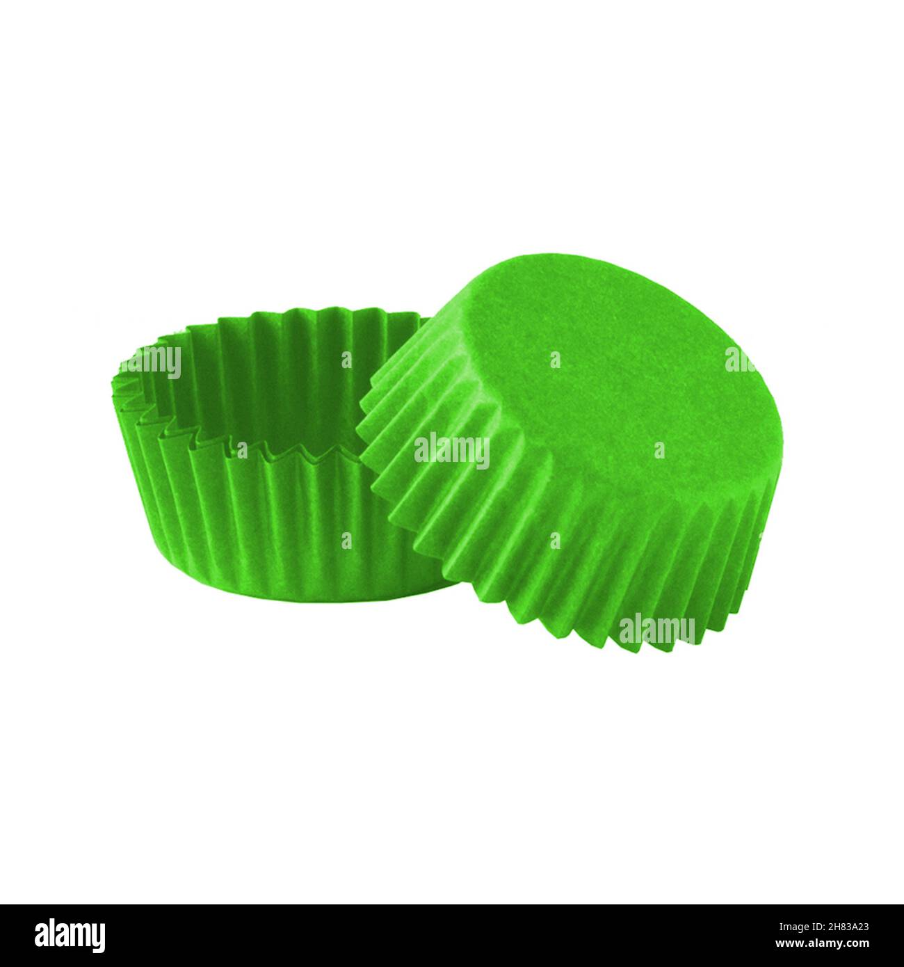 Green paper cupcake forms for baking isolated over white background ...