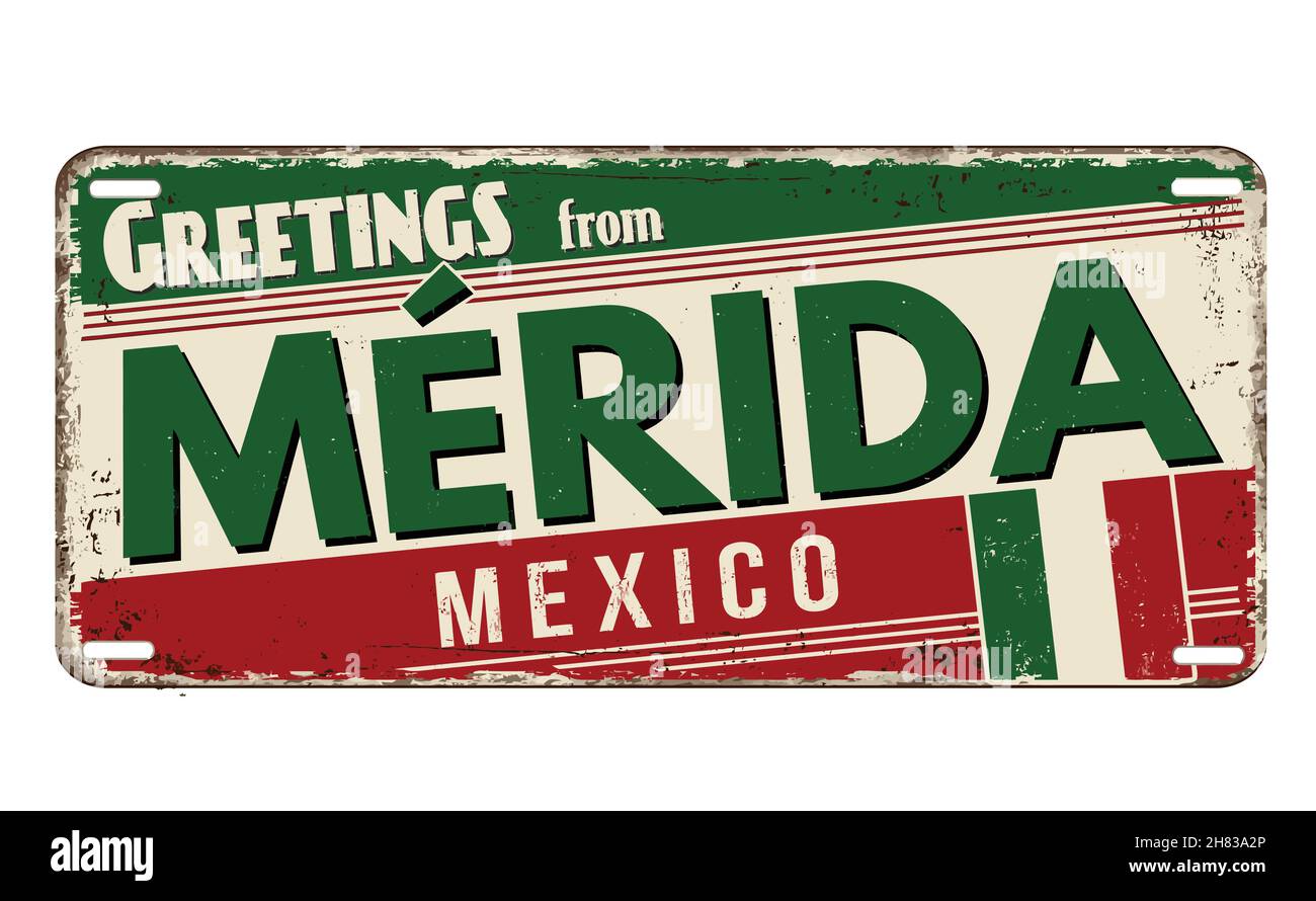 Greetings from Merida vintage rusty metal plate on a white background ...