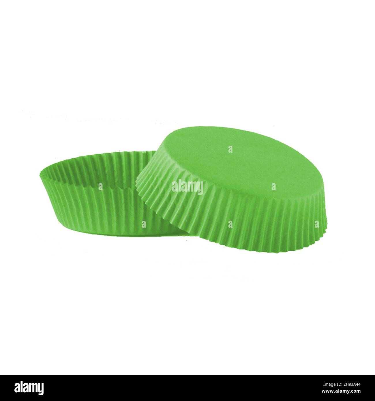 Green paper cupcake forms for baking isolated over white background ...