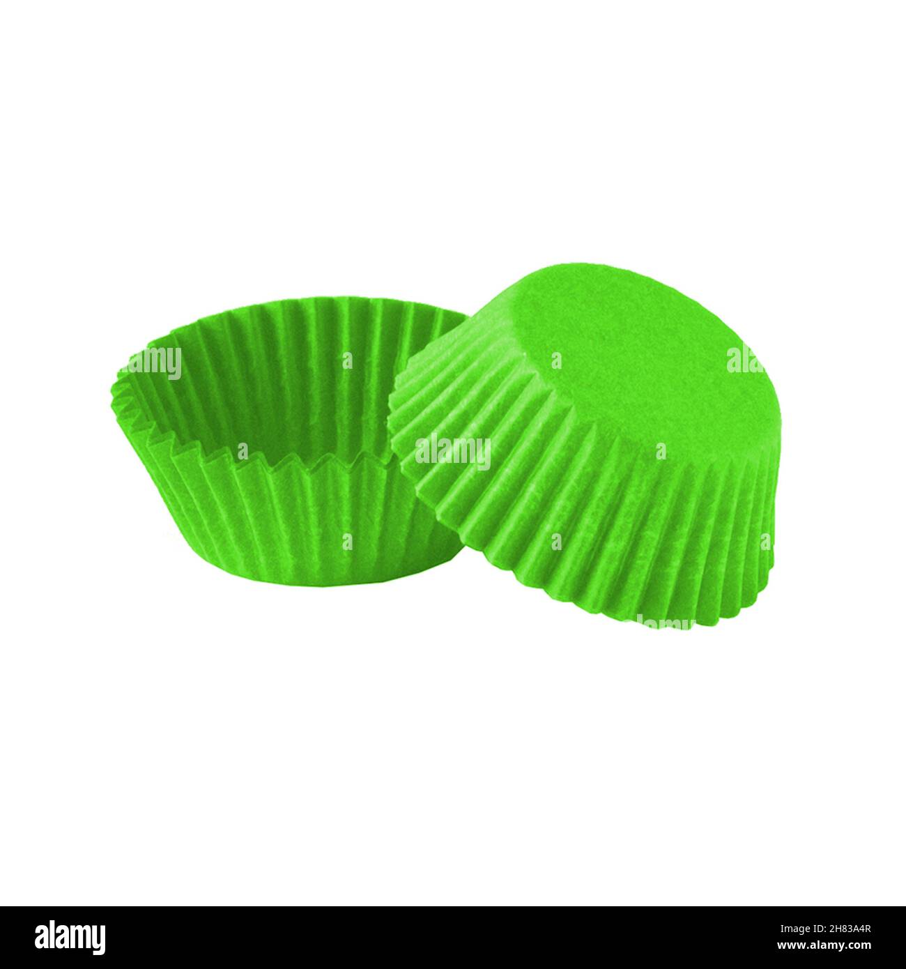 Green paper cupcake forms for baking isolated over white background ...