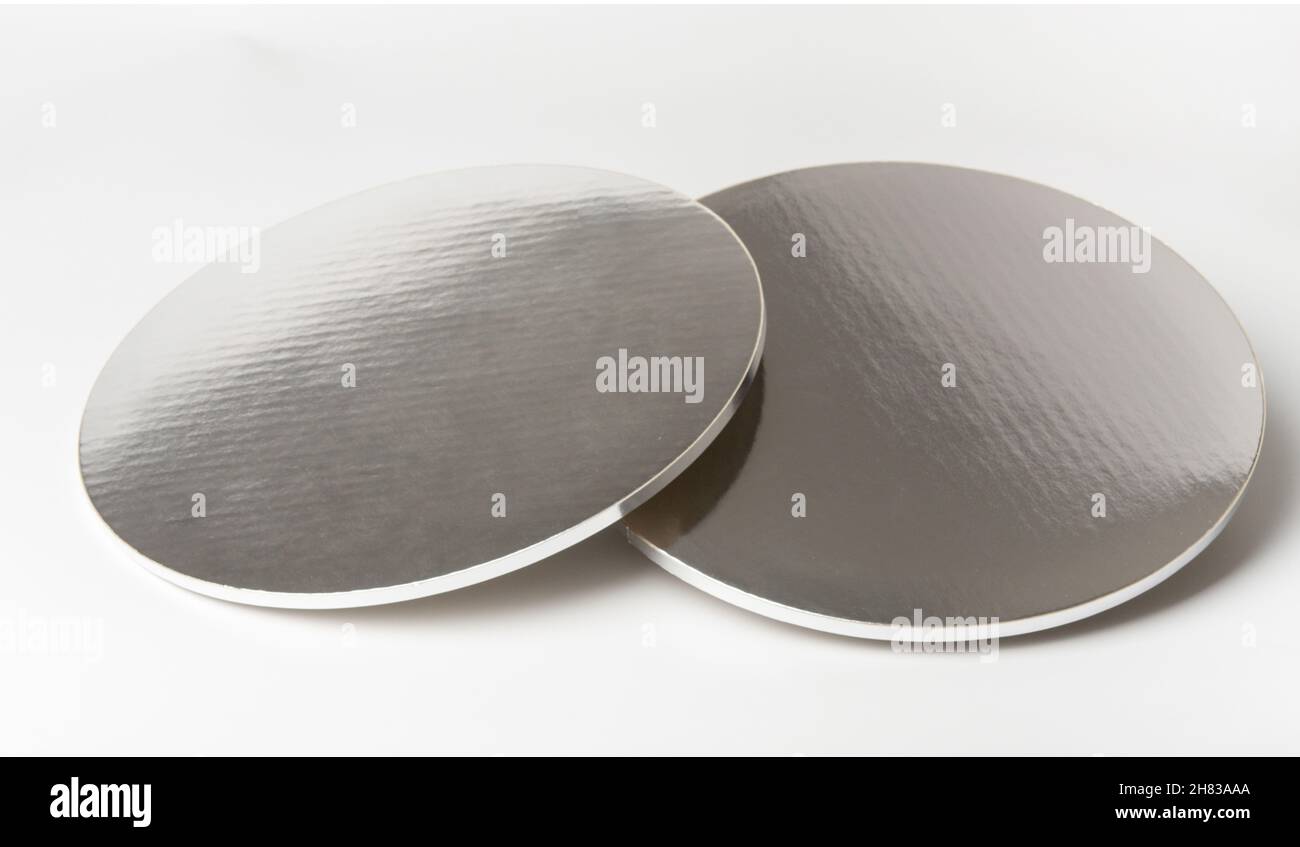 Silver plastic round tray isolated over white background, confectionery ...