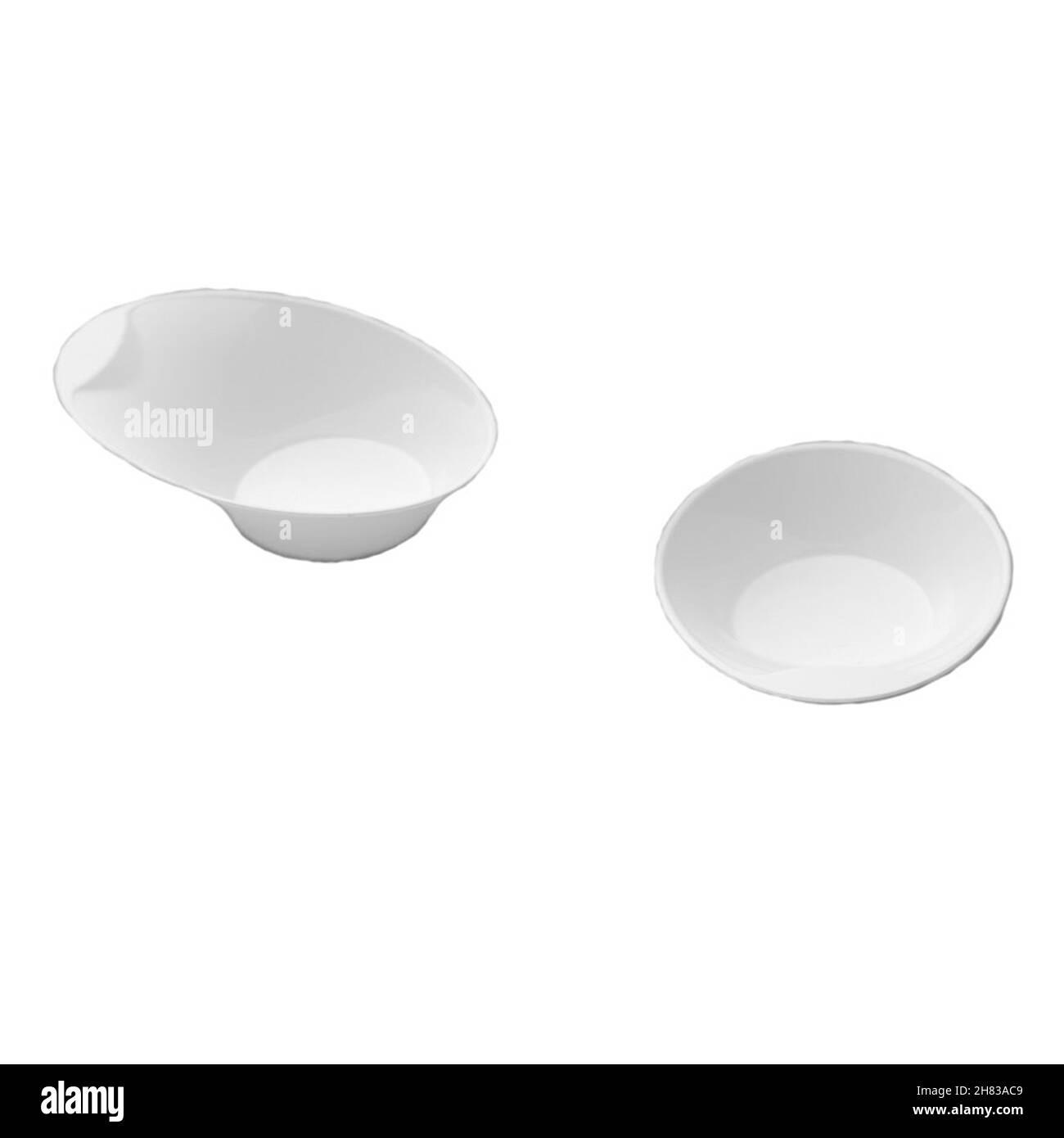 Two white plastic cups isolated over white background, confectionery ...