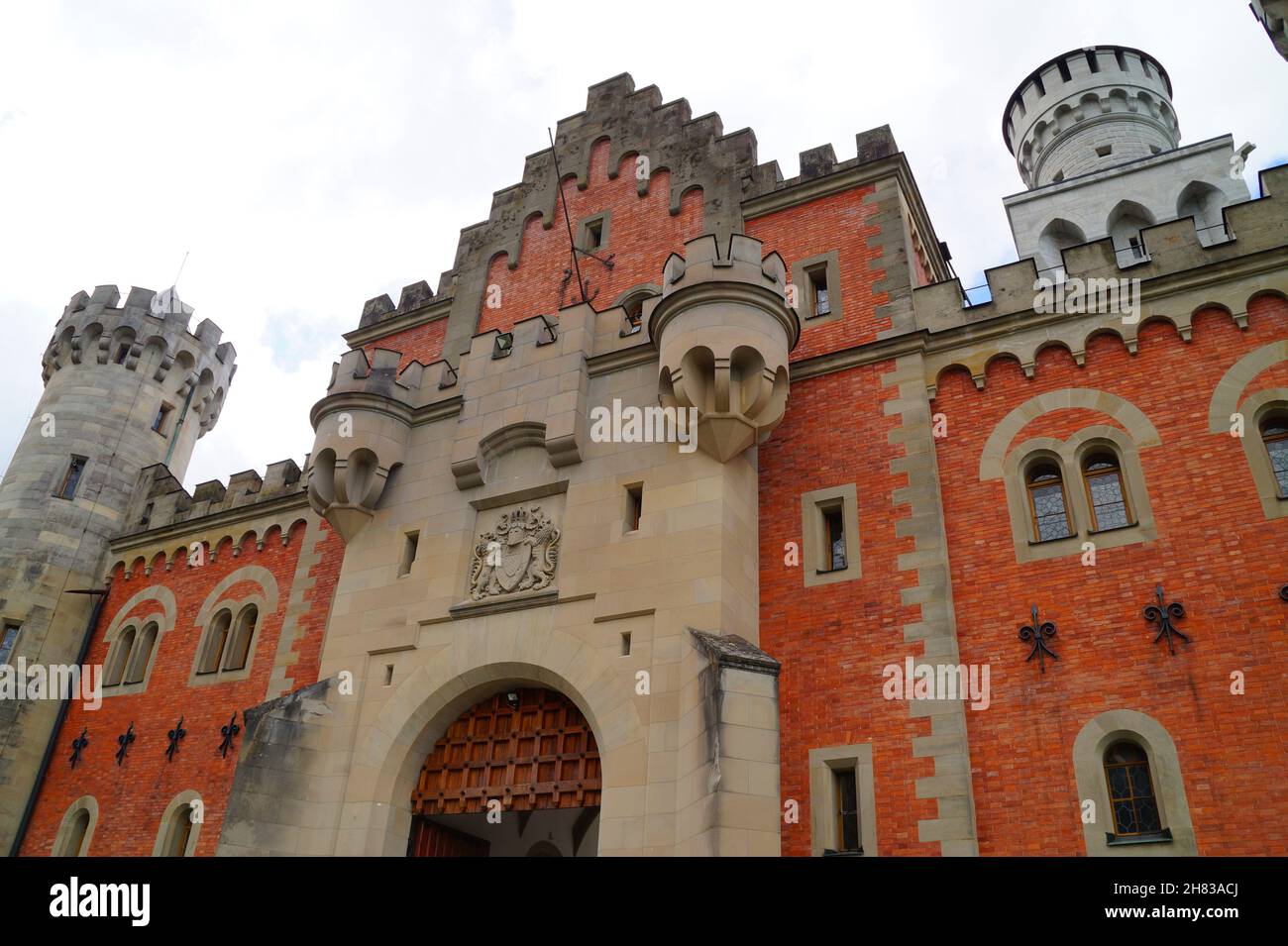 Bavarian castle Neuschwanstein in the Alps and lake Forggensee in the ...
