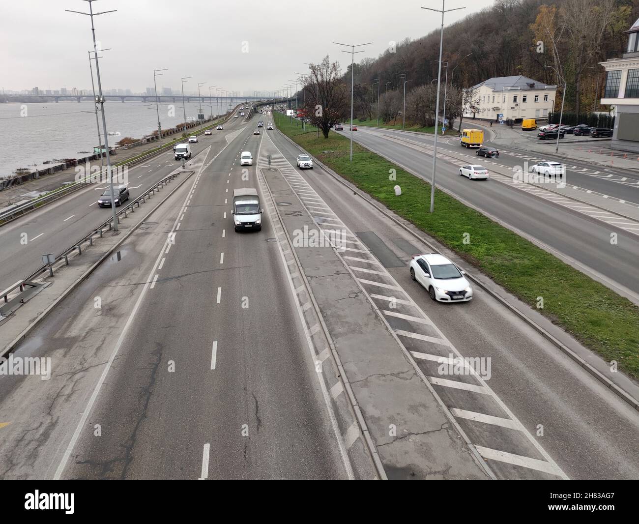 City highway traffic background, cars moving on a freeway during the ...
