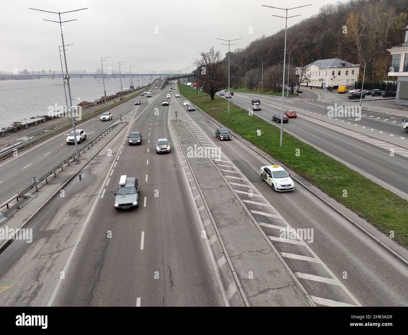 City highway traffic background, cars moving on a freeway during the ...