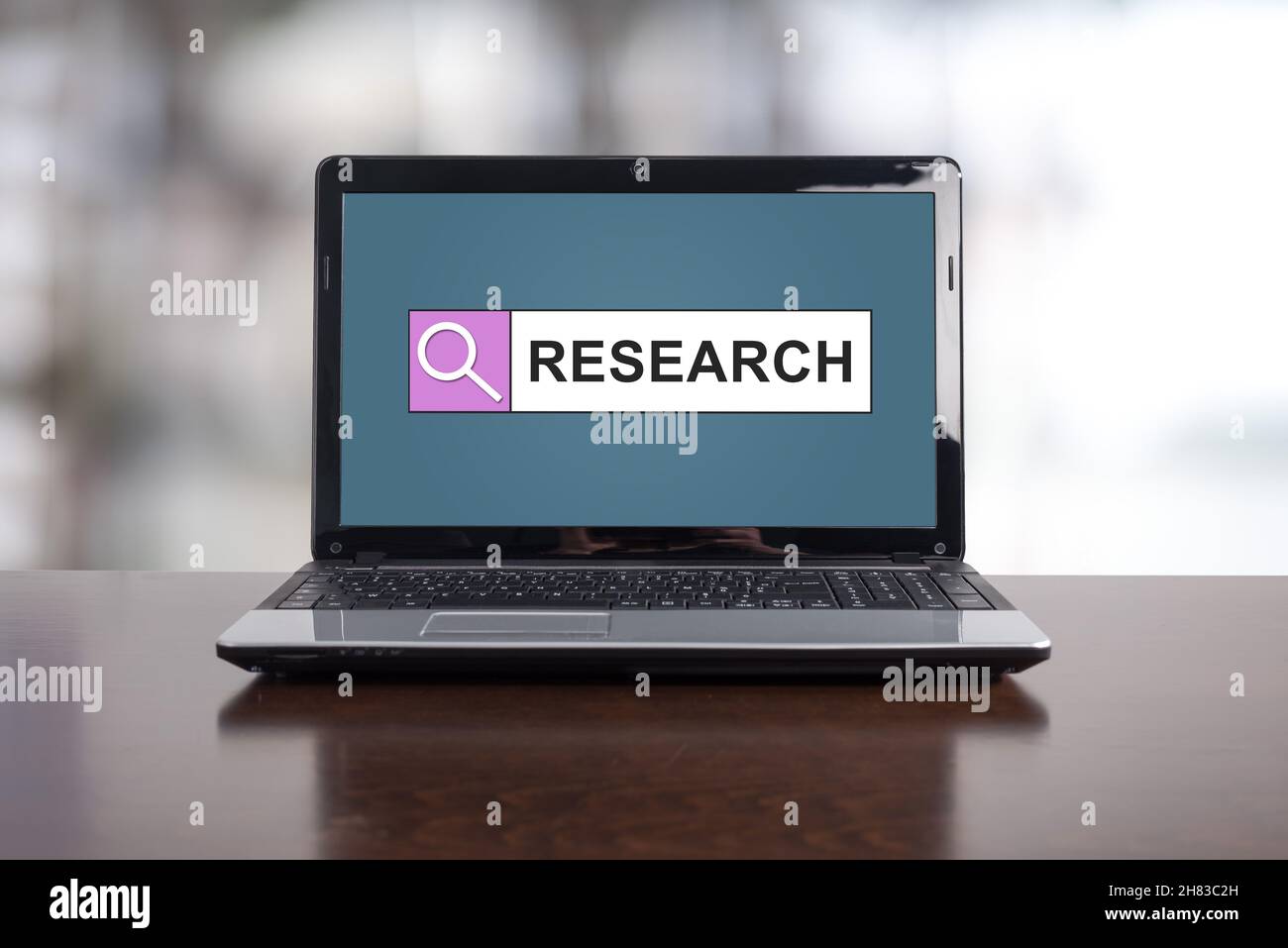 Research concept on a laptop screen Stock Photo - Alamy
