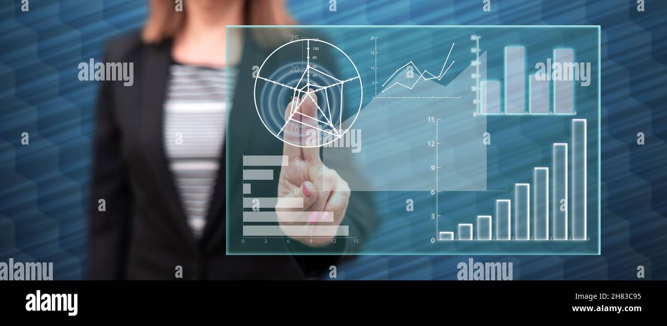 Woman touching a data analysis concept on a touch screen with her ...