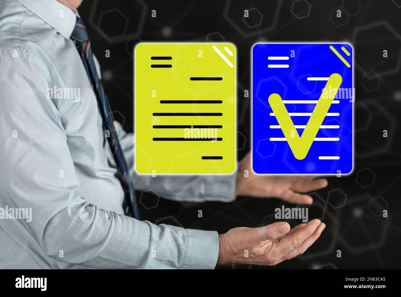 Document validation concept above the hands of a man Stock Photo - Alamy